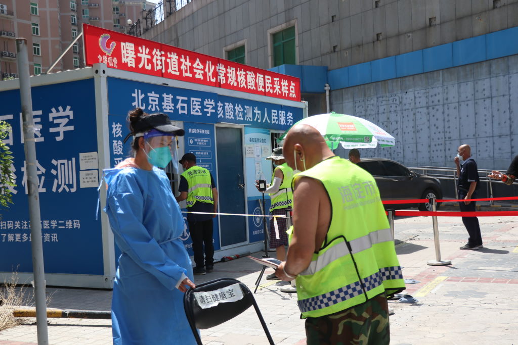 Beijing Says COVID-19 Outbreak Under Control
