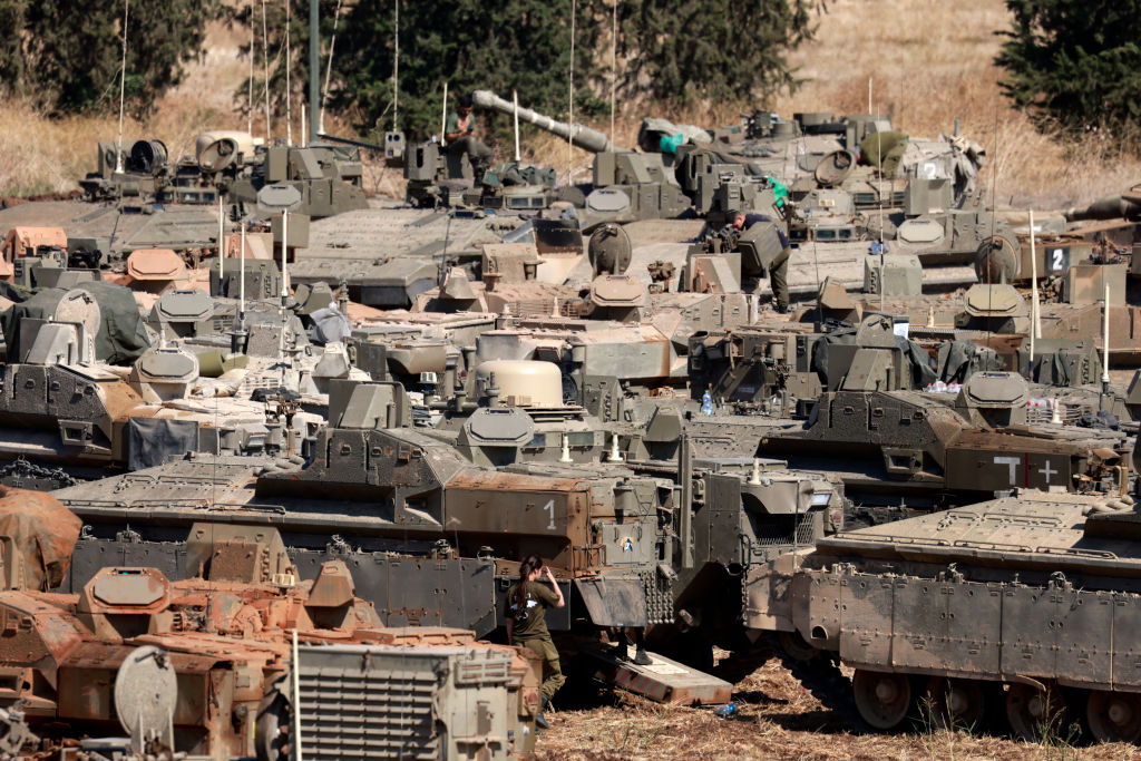 Hundreds of Israeli Tanks Mass on Lebanon Border