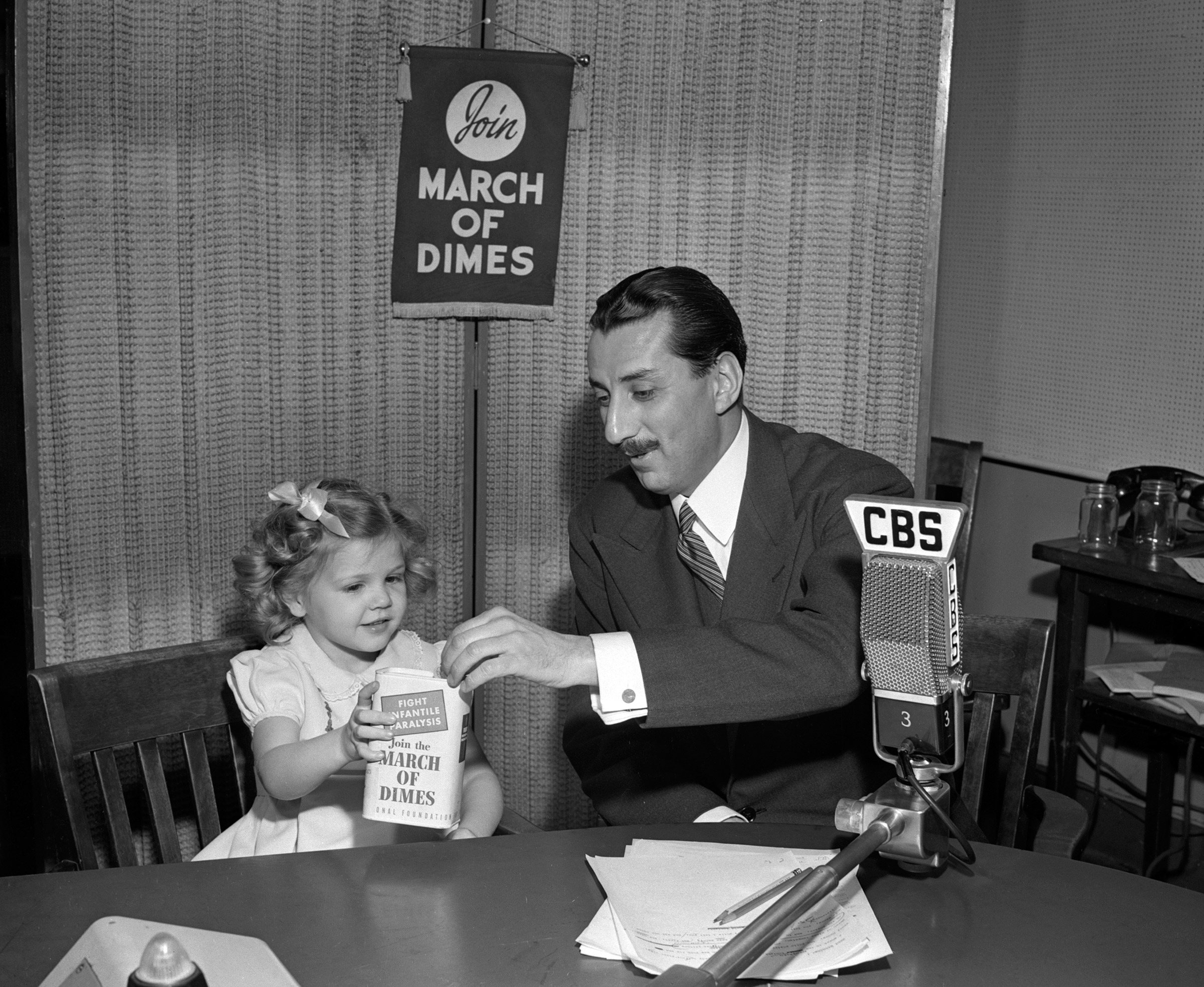 CBS Newsman Robert Trout with Nancy Drury, polio survivor and poster ...